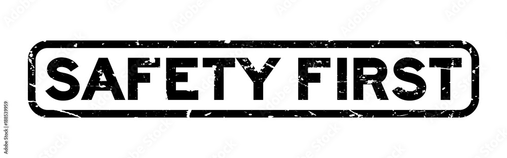 Grunge black safety first square rubber seal stamp on white background ...