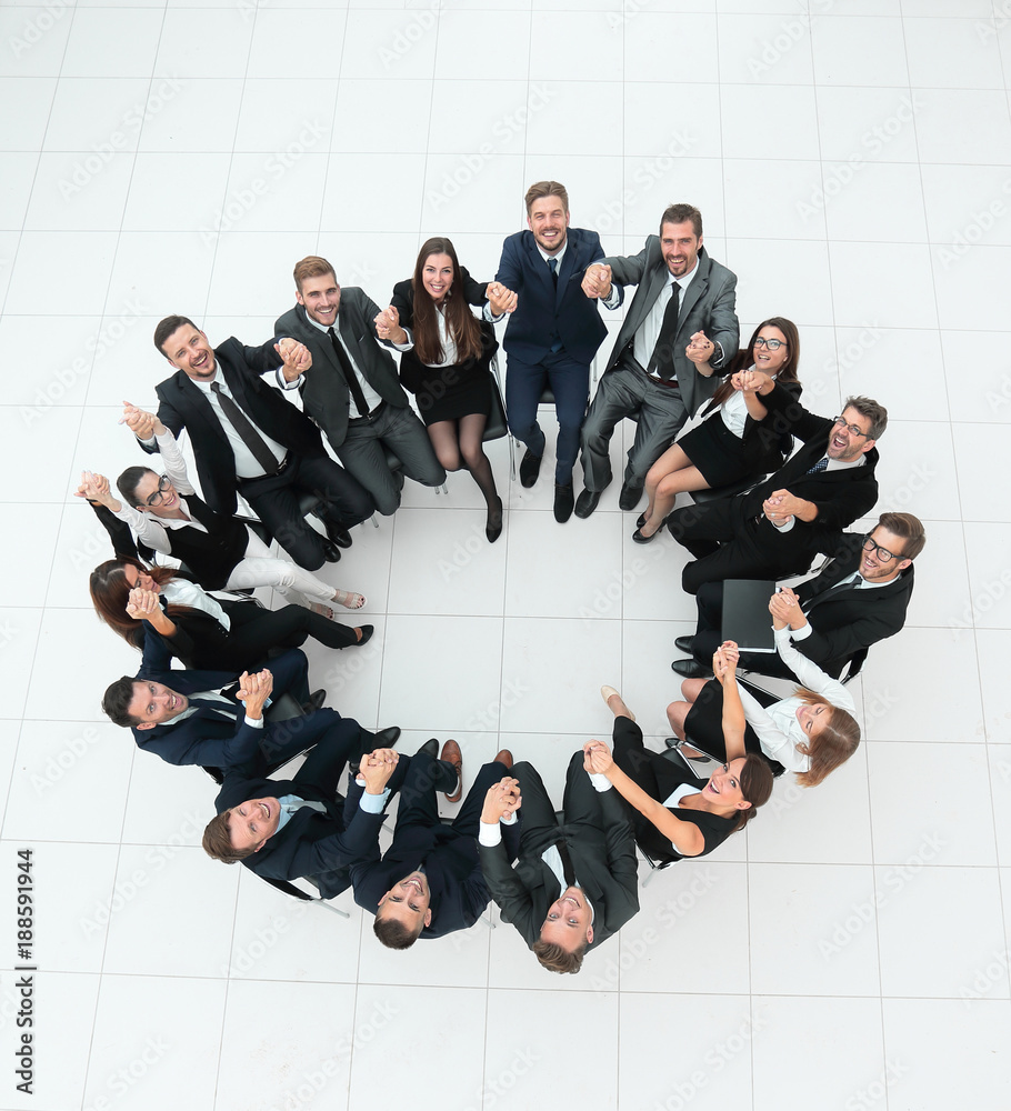 concept of team building .large successful business team sitting in a ...