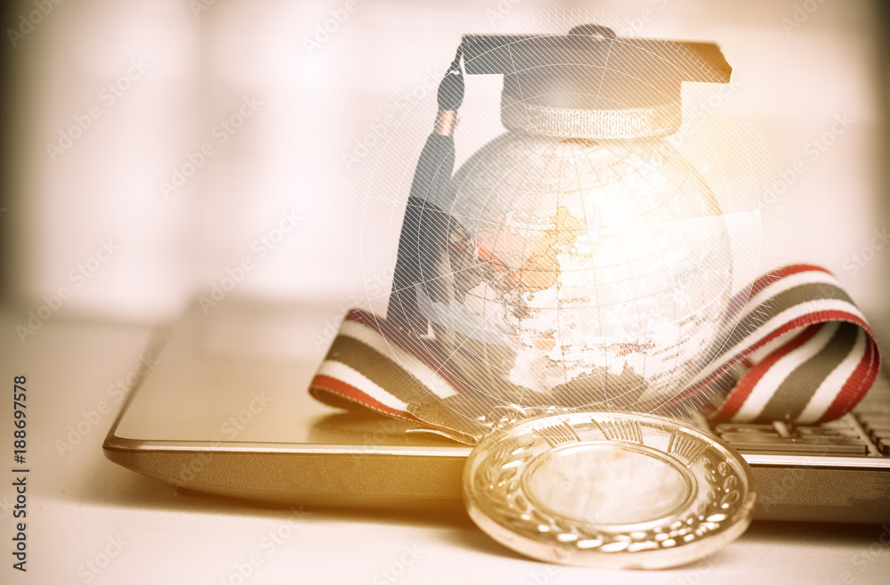 Graduate study abroad concept, Graduation cap on top Earth globe model ...