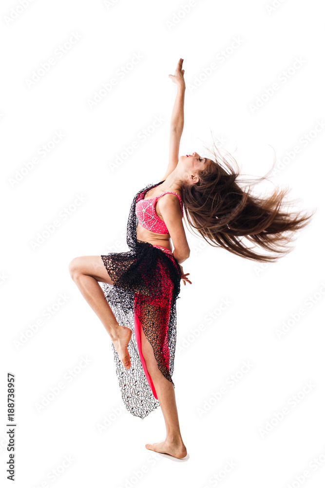 Beautiful girl dancing belly dance in red attire. A dancer performs an ...