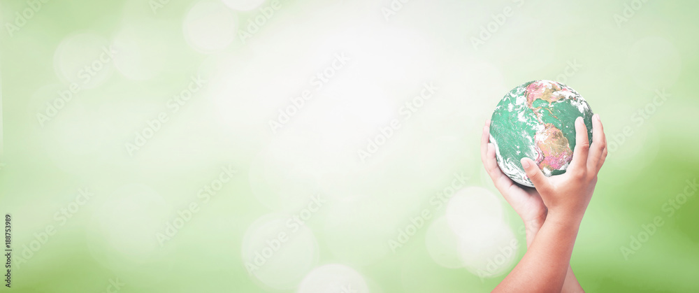 World environment day concept: Two human hands holding earth globe over ...