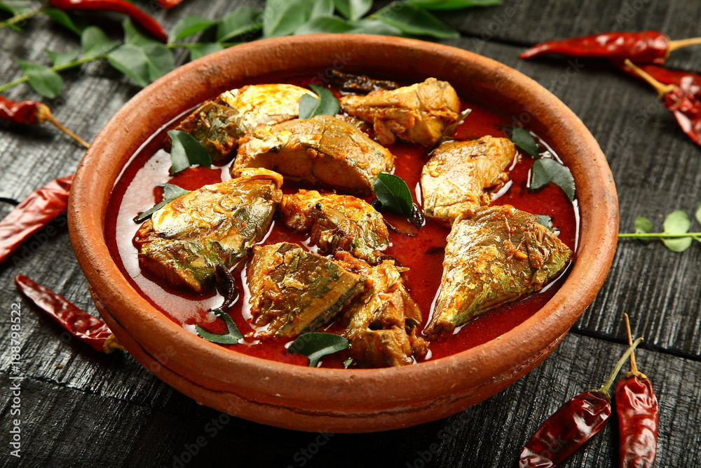 Homemade spicy fish curry from Kerala cuisine. Stock Photo | Adobe Stock
