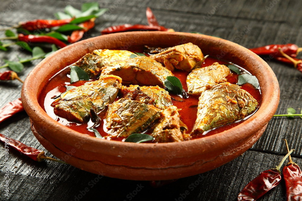 Homemade spicy fish curry from Kerala cuisine. Stock Photo | Adobe Stock