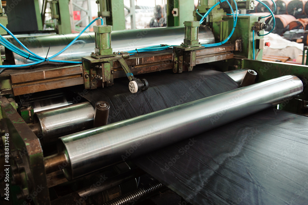The process of rolling rubber Stock Photo | Adobe Stock