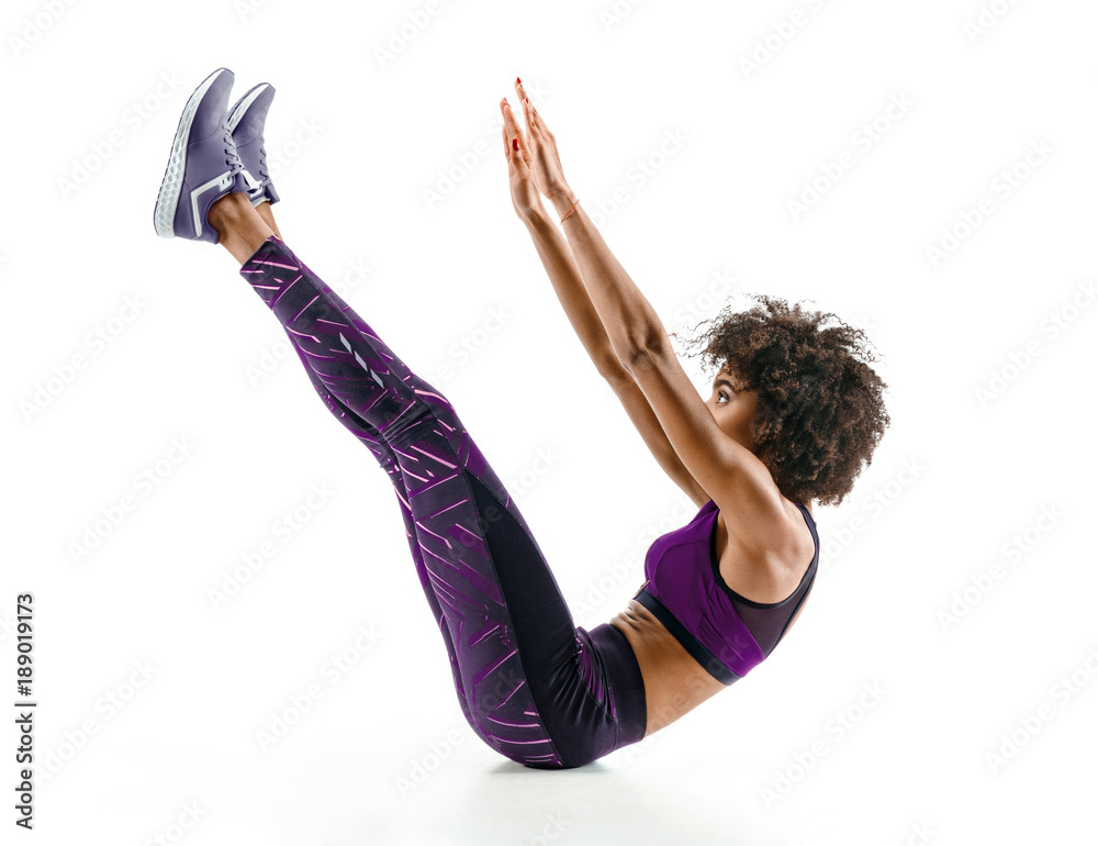 Young girl doing fitness exercise. Photo of muscular girl in silhouette ...
