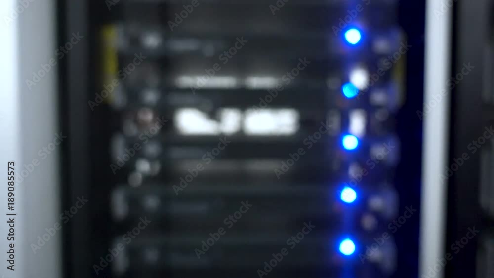 Servers close up. Blurred. Modern datacenter. Cloud computing. Datacenter with flashing lights ...