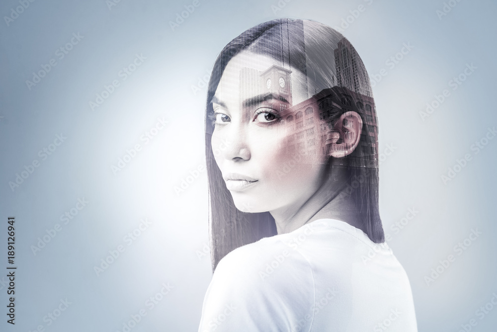 Love my surrounding. Young model standing in semi position and turning ...