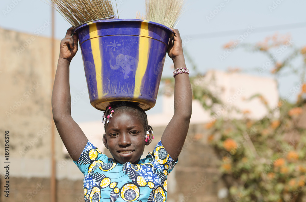 Beautiful African Child Helping Her Family - Child Labour Symbol for ...