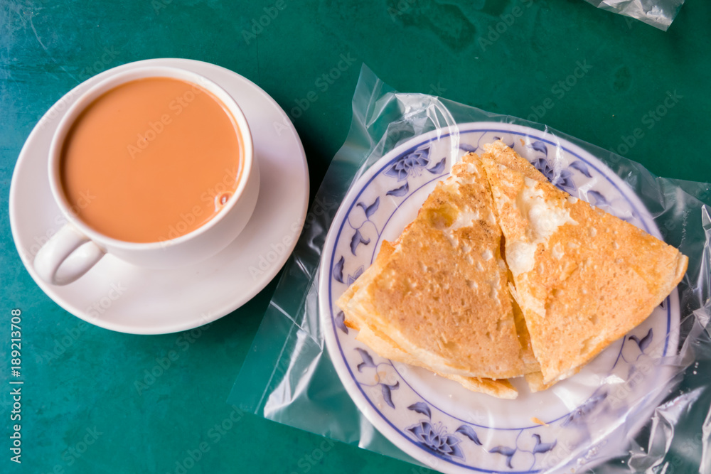 Burmese milk tea and na'an Stock Photo | Adobe Stock