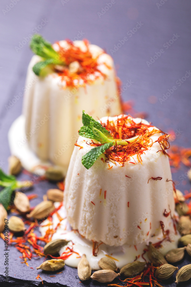 Indian kulfi dessert, ice cream with safron, mint, nuts Stock Photo ...