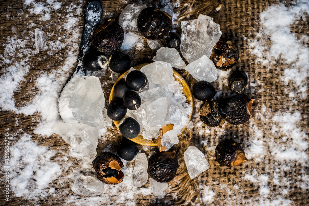 Close up of alum, potassium aluminium sulfate and soap nut,Sapindus ...