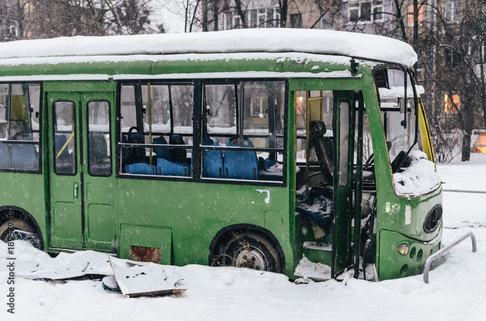 The abandoned passenger bus after the explosion. Inside, you can see ...