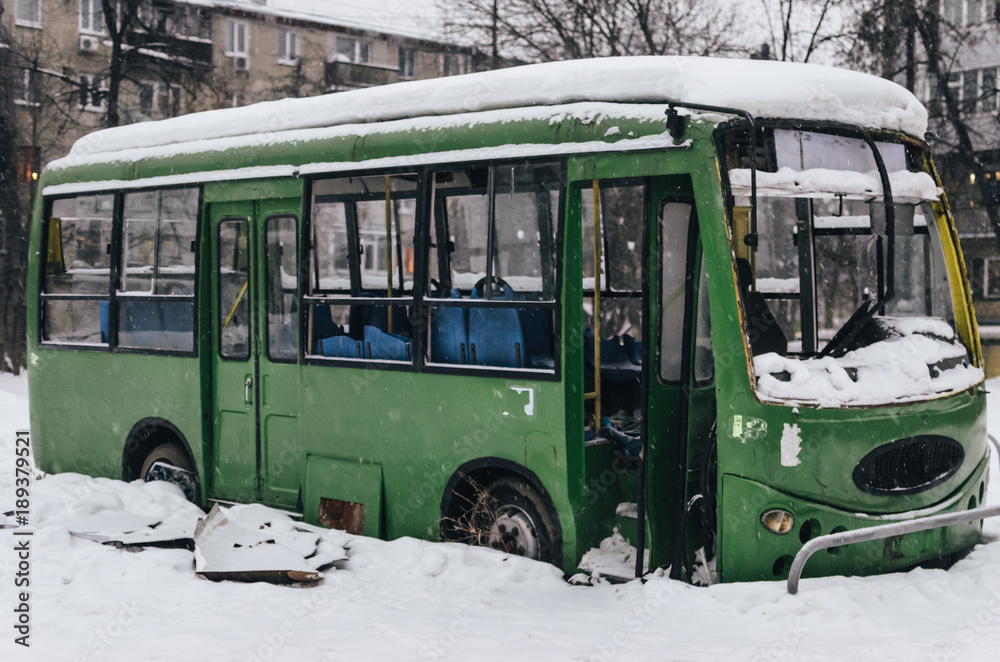 The abandoned passenger bus after the explosion. Inside, you can see ...