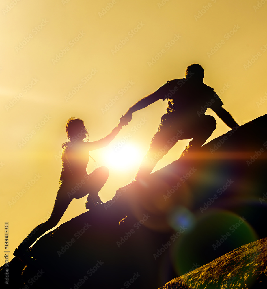 The joint work teamwork of two people man and girl travelers help each ...