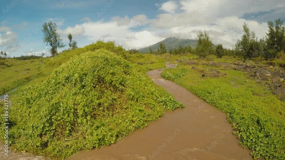 The foot of the Mayon Volcano with flowing mountain rivers near Legazpi ...