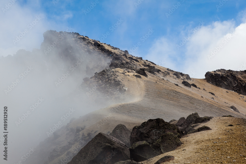 Rim of the Guagua Pichincha volcano from where the fog comes Stock ...