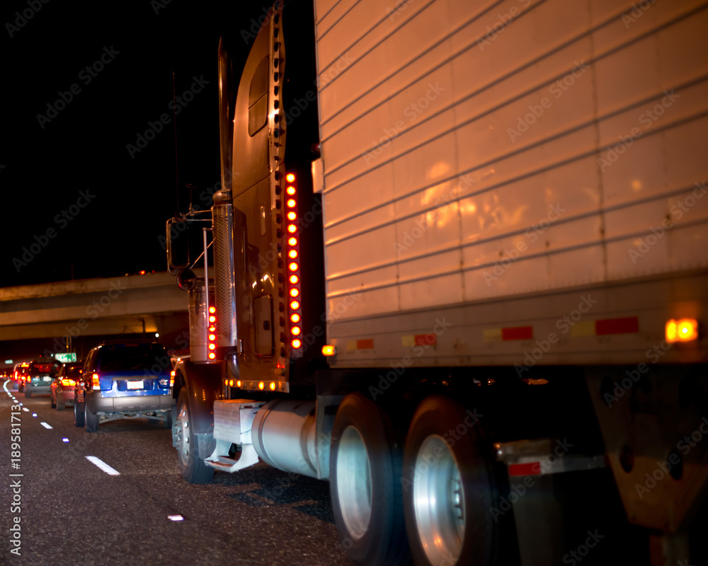 Big rig semi truck with reefer trailer move on the night road in ...