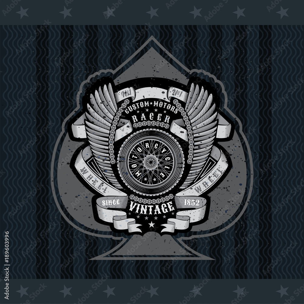 Motorbike wheel between wings, ribbons and chain. Vintage motorcycle ...