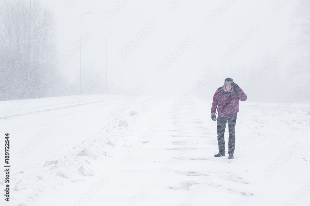 Winter is coming by snow. Poor visibility in heavy snow storm on path ...