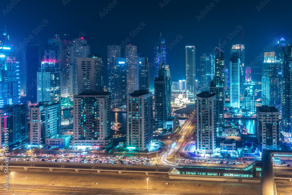 Aerial view of big highway interchange with traffic in Dubai, UAE, at ...