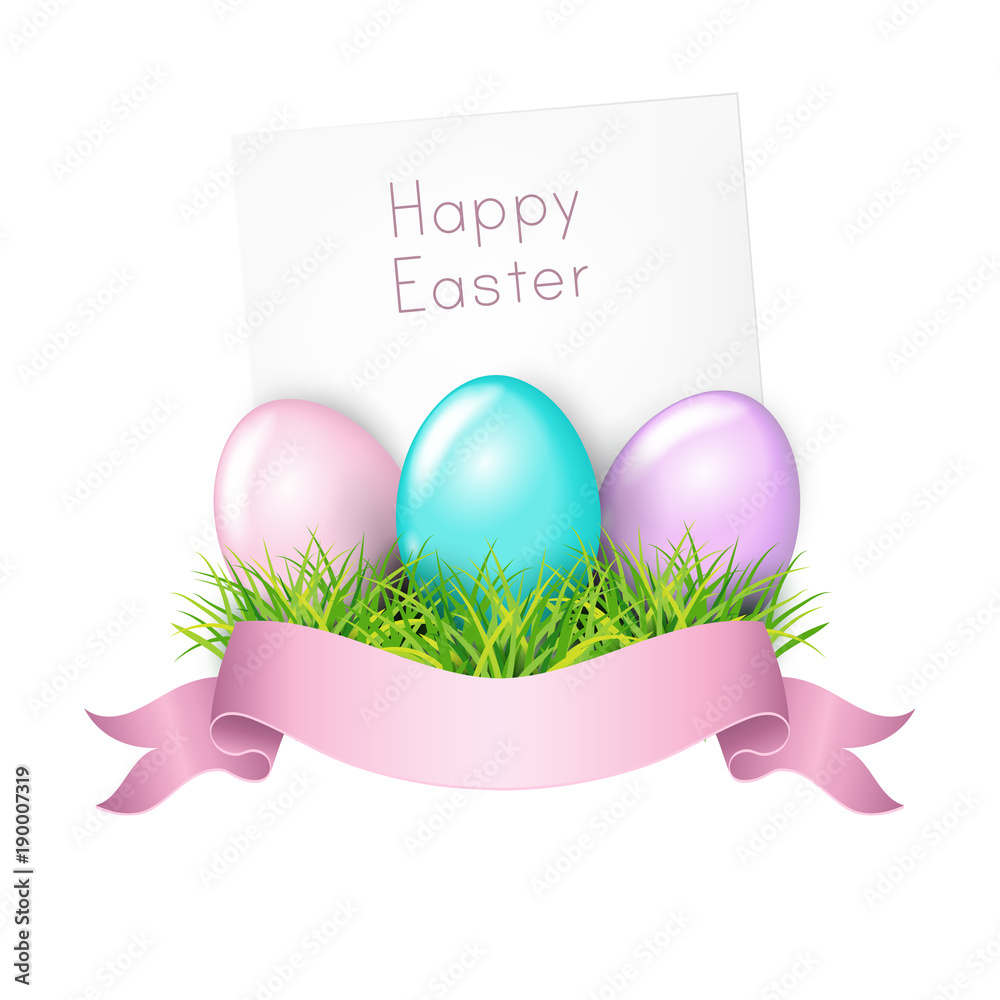 Colorful Easter eggs in green grass with white paper and ribbon ...