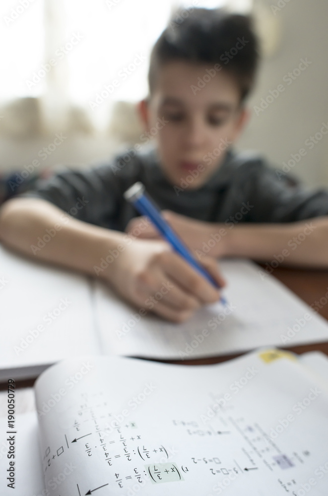 Child do his homework Stock Photo | Adobe Stock