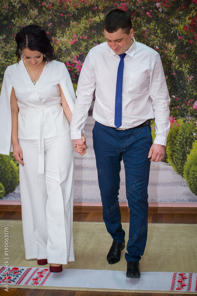 A modest betrothal of the newlyweds at the registry office in a small ...