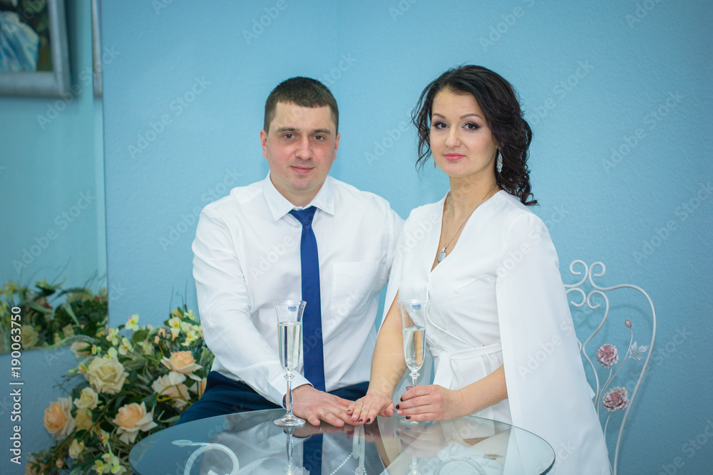 A modest betrothal of the newlyweds at the registry office in a small ...