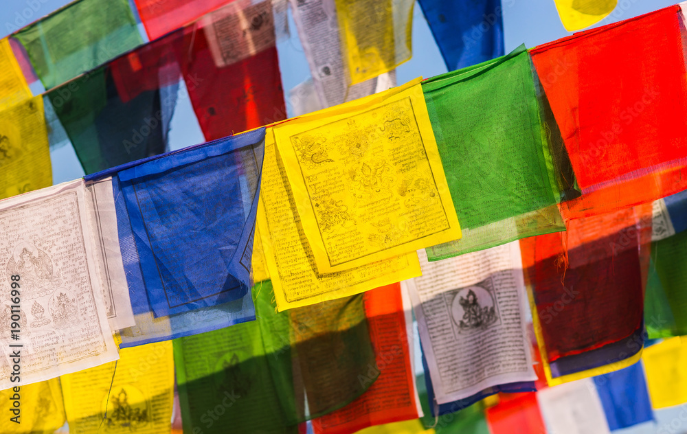 Colorful buddhist Prayer flags and blue sky Stock Photo | Adobe Stock