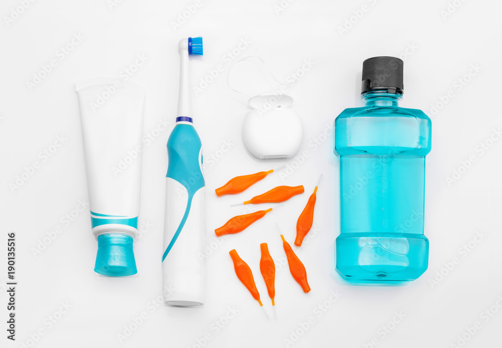 Tools for dental care: orthodontic brush, floss, toothpaste. Invisible ...