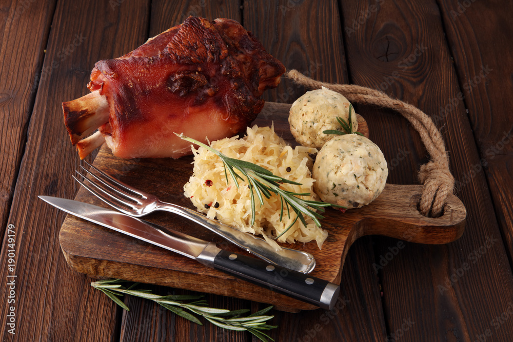 Roasted pork knuckle. Ham and bacon are popular foods in the west ...