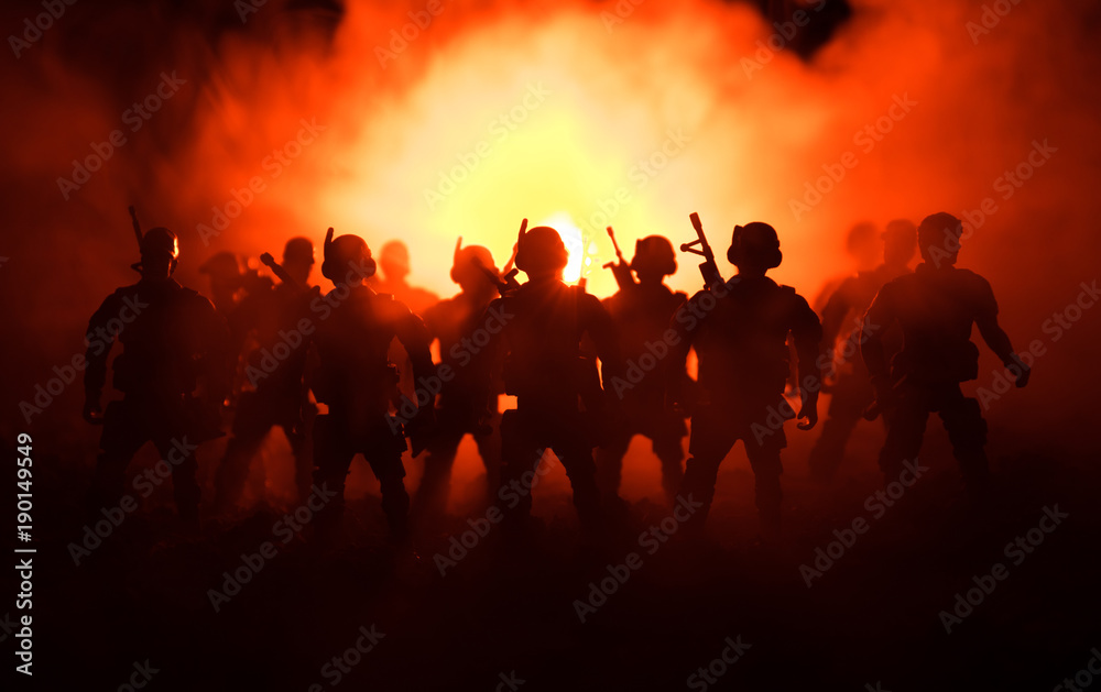 War Concept. Military silhouettes fighting scene on war fog sky ...