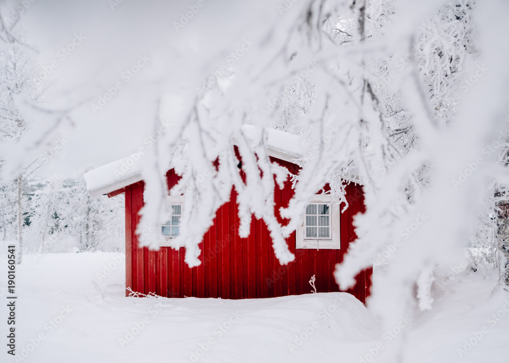 Tiny cute red cabin in winter white forest Stock Photo | Adobe Stock