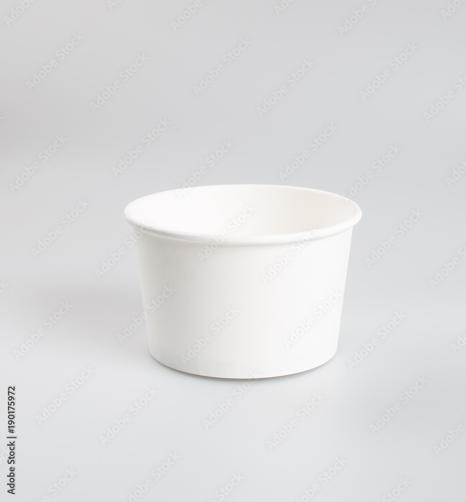 Paper food container or cup on a background. Stock Photo | Adobe Stock