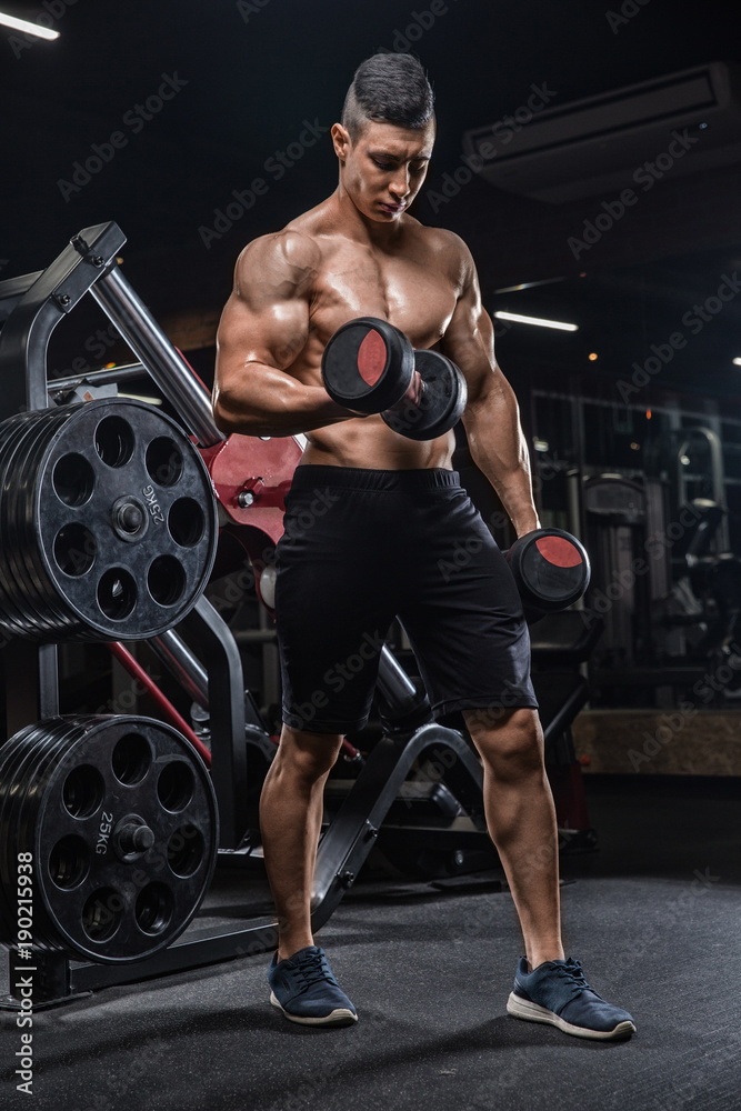 Strong bald bodybuilder with six pack. Bodybuilder man with perfect abs ...