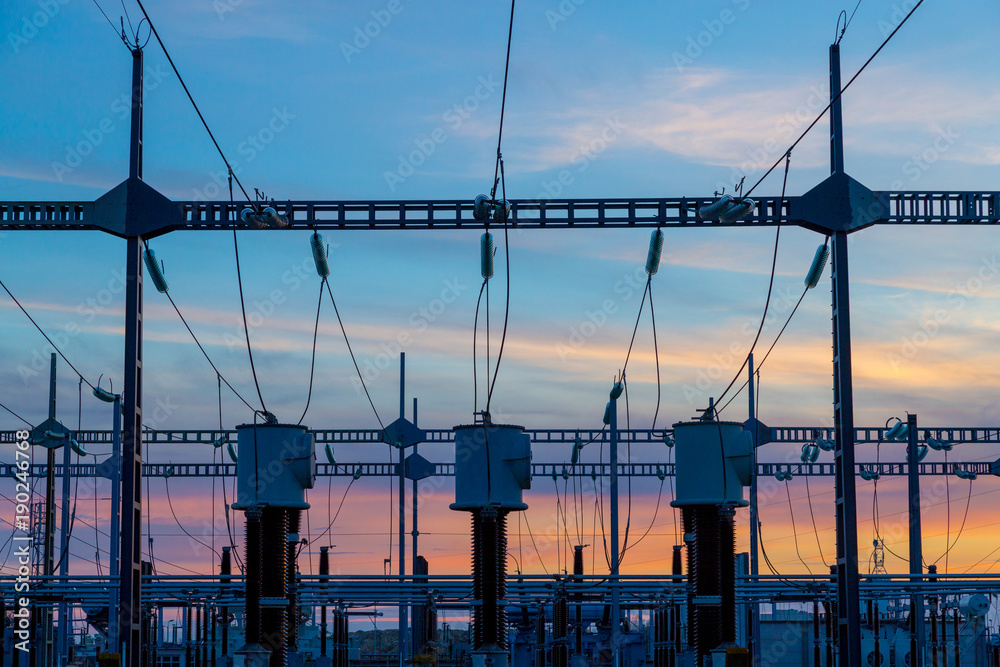 High-voltage power lines at electricity distribution station Stock ...