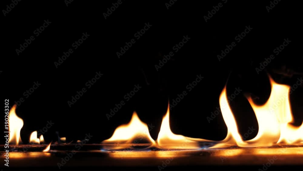 Clean Fire Flames Igniting And Burning - Slow Motion. A line of real ...