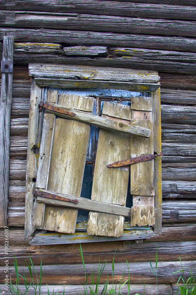 Window of wooden house closed with collapsed shutter Stock Photo ...