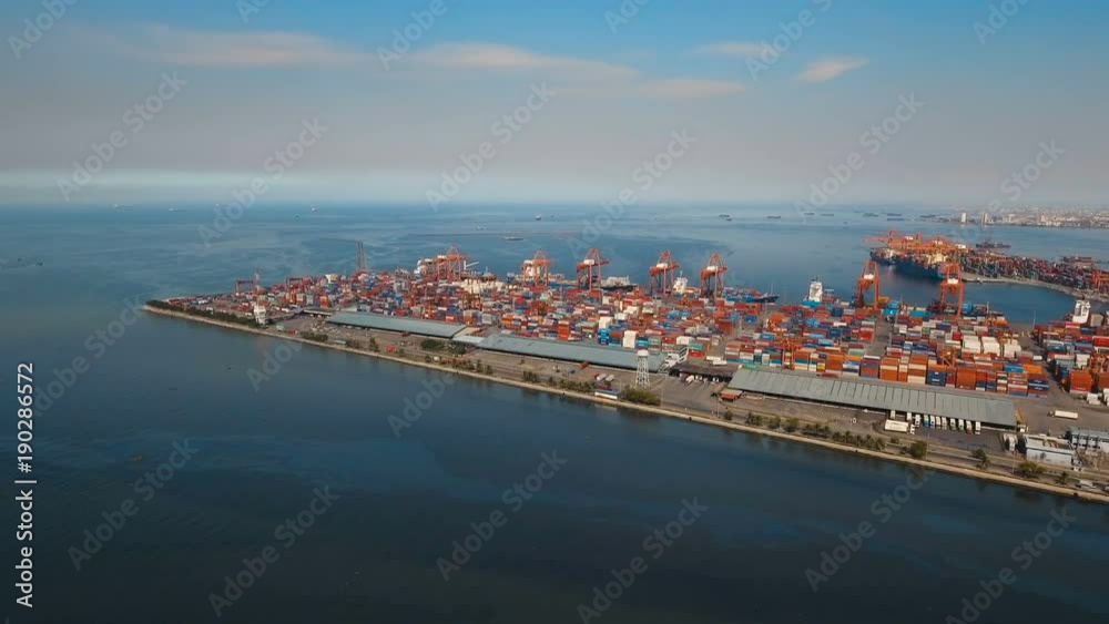 Aerial view industrial cargo port with ships and cranes. View of the ...