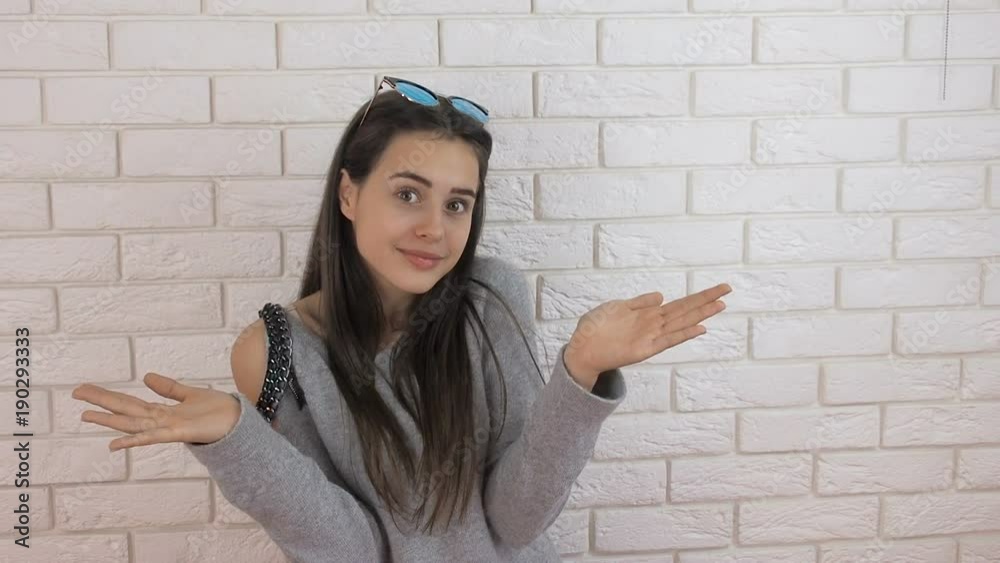 Sign Language. The gesture of Oops. A beautiful girl is showing an oops gesture. Stock ビデオ ...