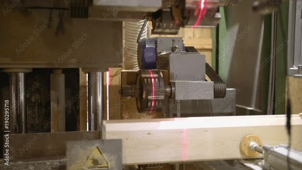 Carpenter machine with laser pointer makes precise furrow on wooden ...