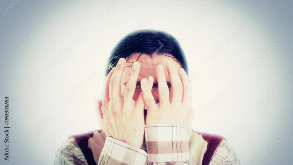 An ugyl nerd crying and screaming while covering his face with his ...