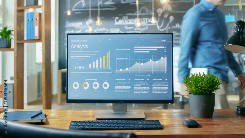 Personal Computer with Mobile Application Design Showing on the Monitor ...