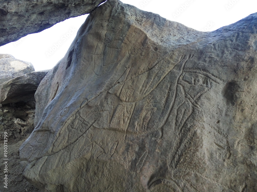 Ancient rock carvings Stock Photo | Adobe Stock