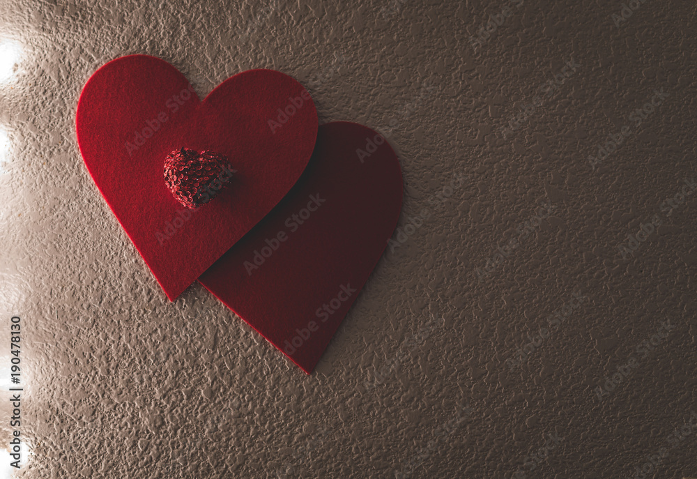 two hearts stack on each other with another smaller heart inside the ...