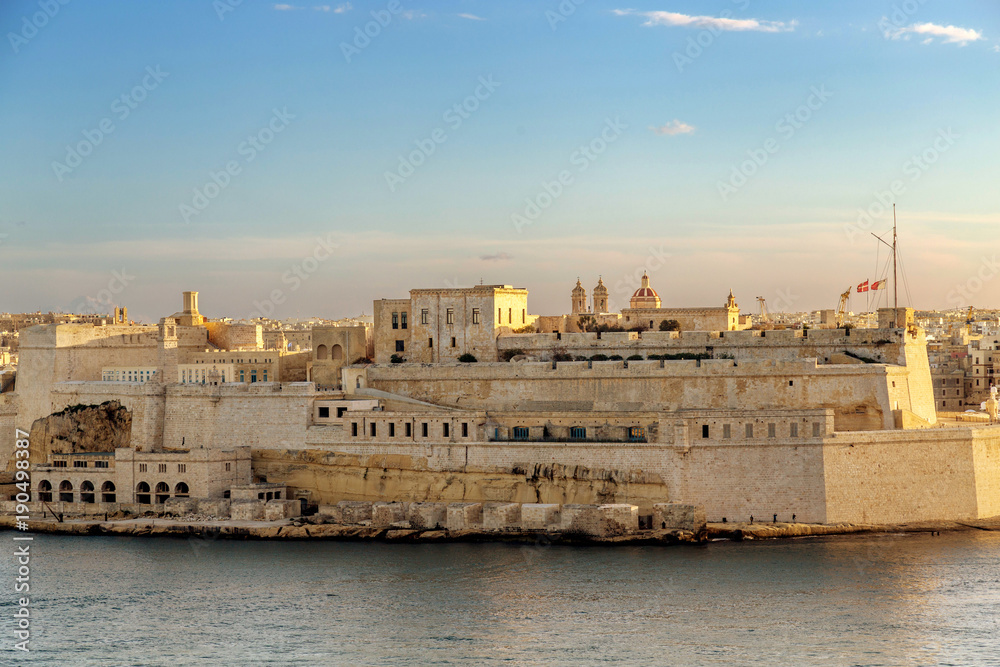 Fort Saint Angelo is a large bastioned fort in Birgu, Malta, located in ...