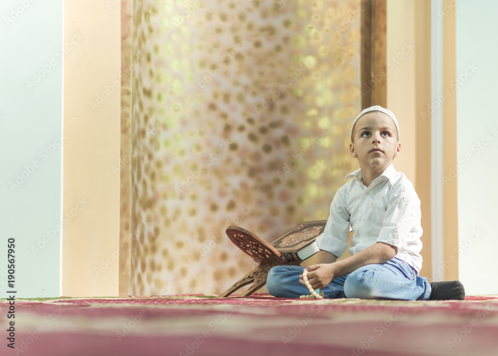 beautiful boy Muslim is praying in mosque,Peace and love in the holy ...