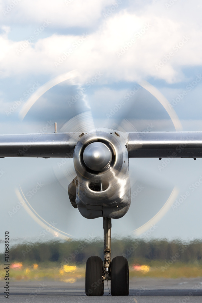 Airplane turboprop engine with propeller running, close up, vertical ...
