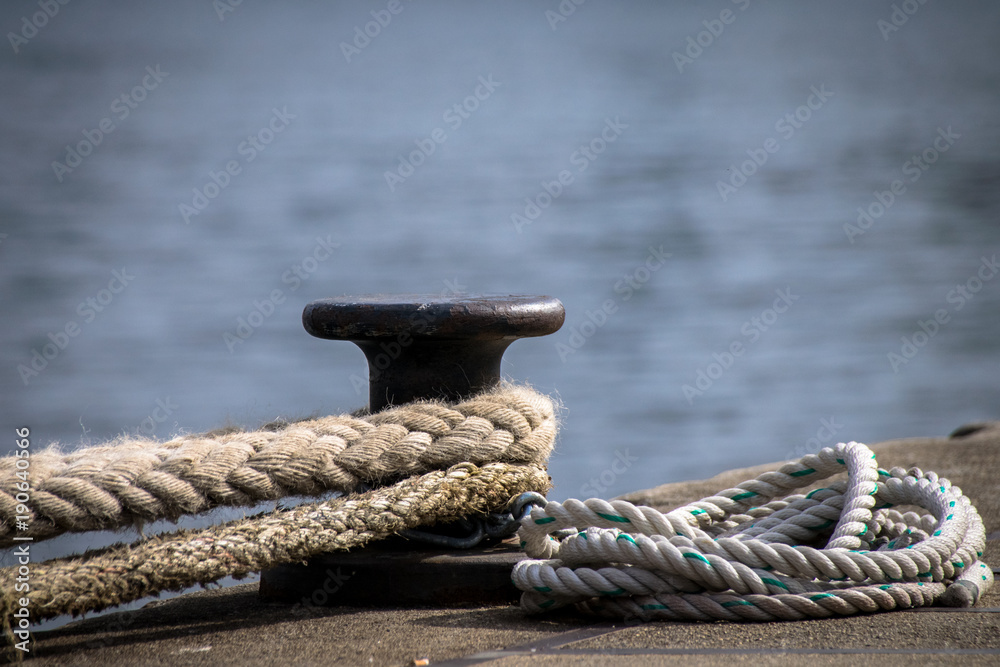 Poster Ship mooring ropes secured around a port bollard – Wall Art ...