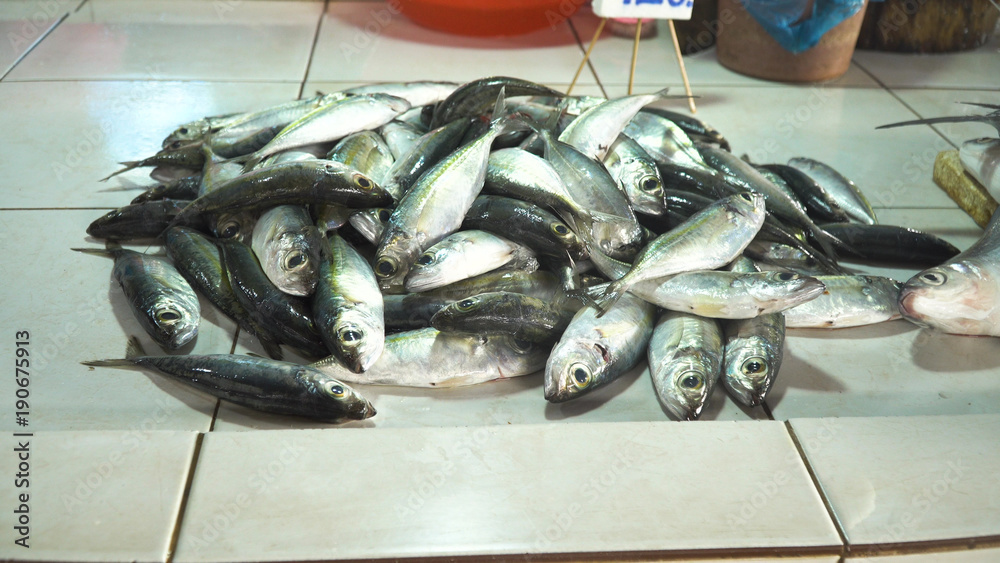 Fresh fish in Asian market. Sale of fresh sea fish in the Asian public ...